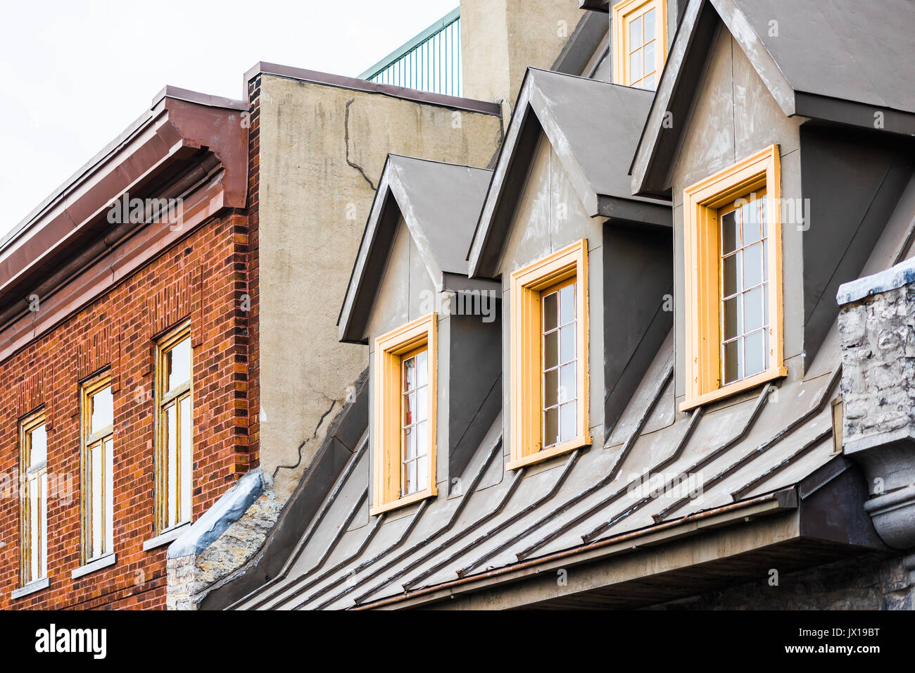 European stone and brick houses buildings in old city with cloudy sky ...