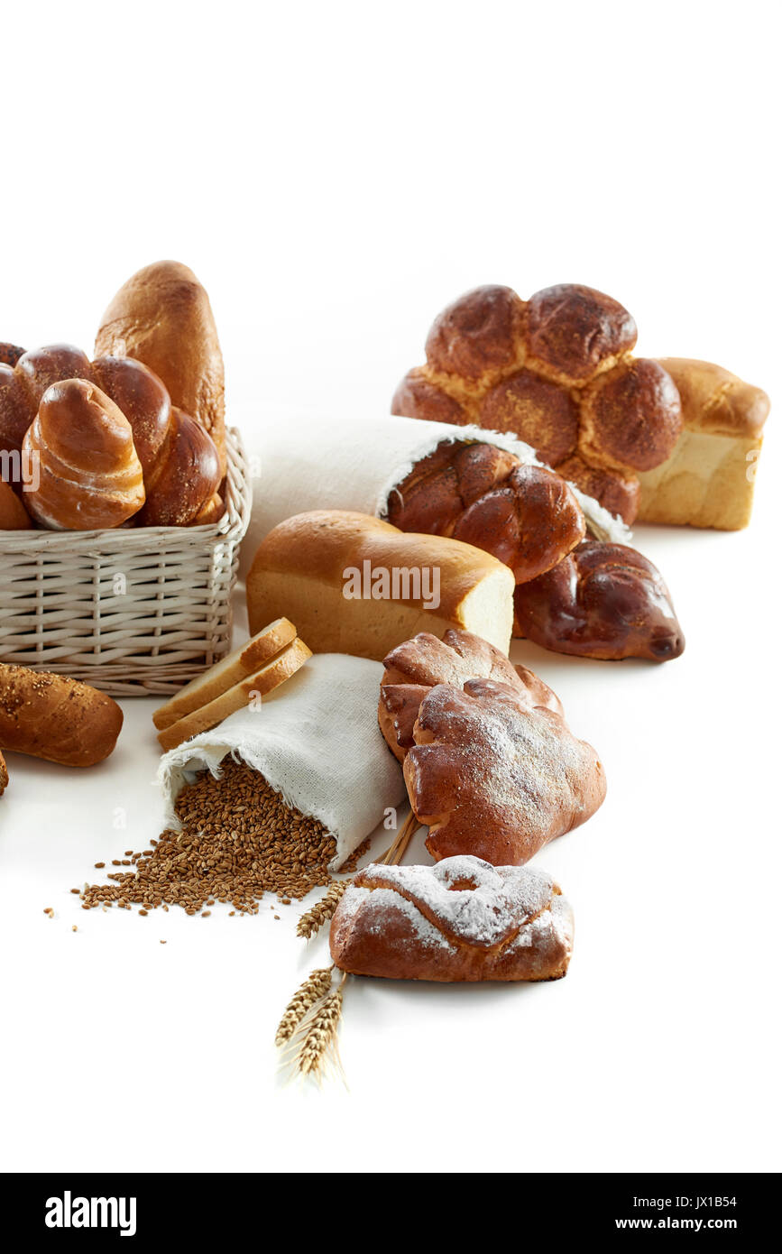 Assorted breads isolated on white Stock Photo - Alamy