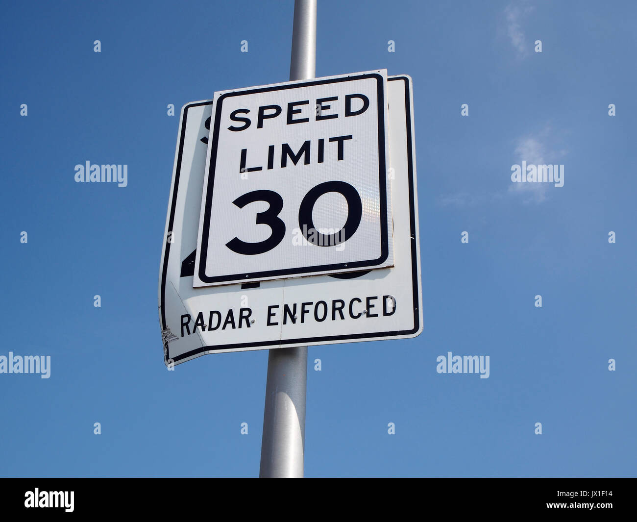 Sign of speed limit and radar enforced Stock Photo - Alamy