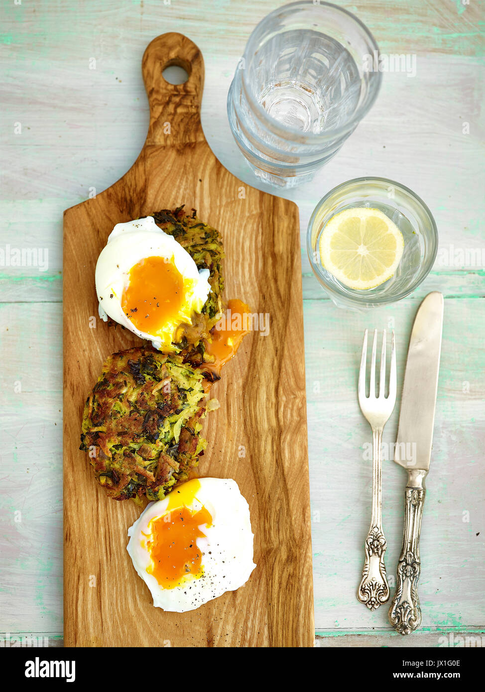 Fried egg and vegetable rosti Stock Photo - Alamy