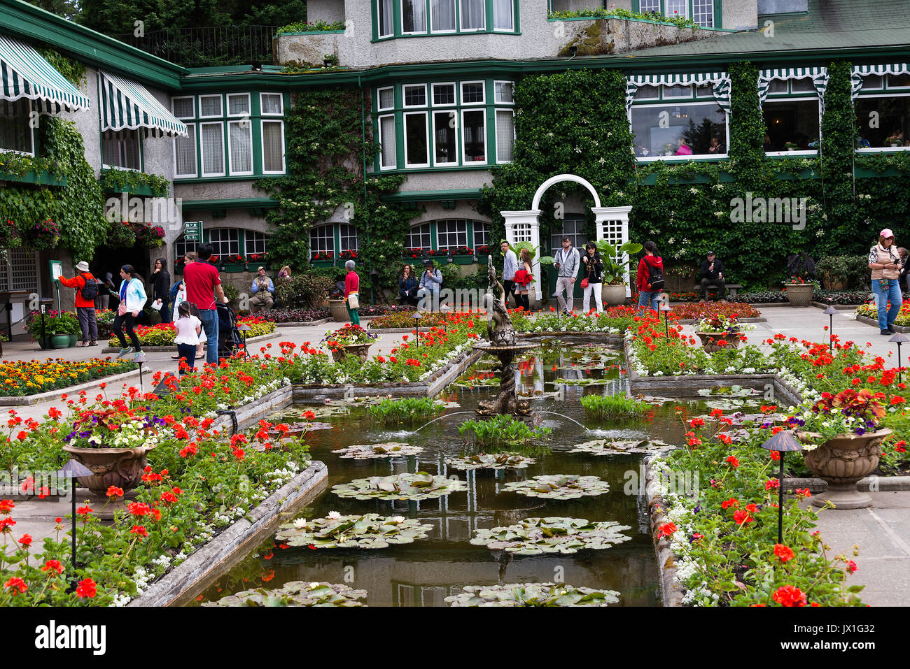 The Formal Italian Garden with Water Feature Planted Out with Red ...