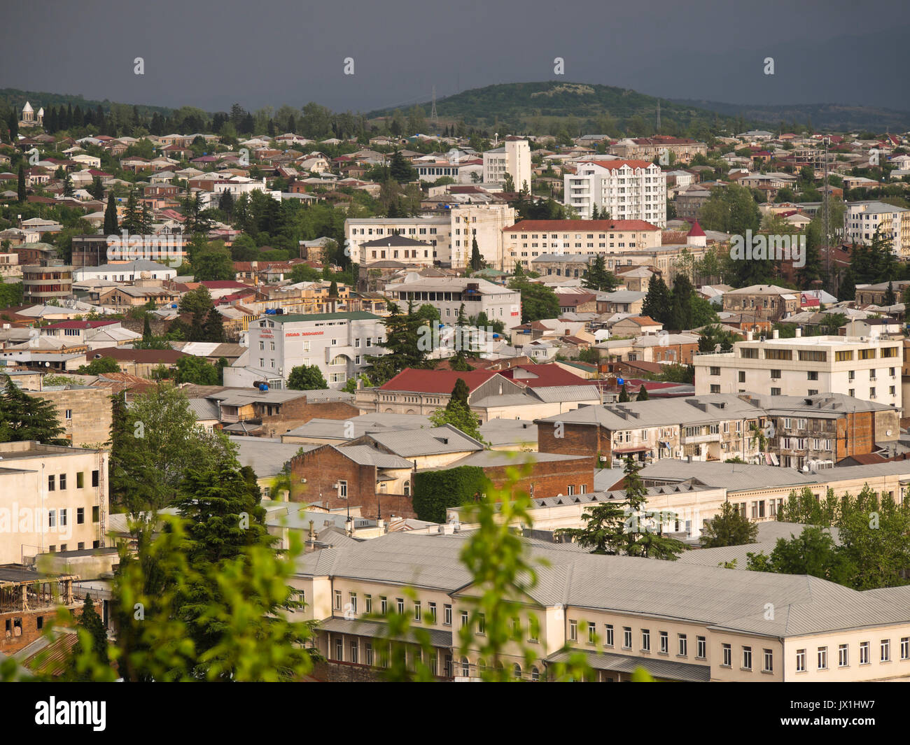 Panorama view of the city of Kutaisi in Georgia, evening sunlight and ...