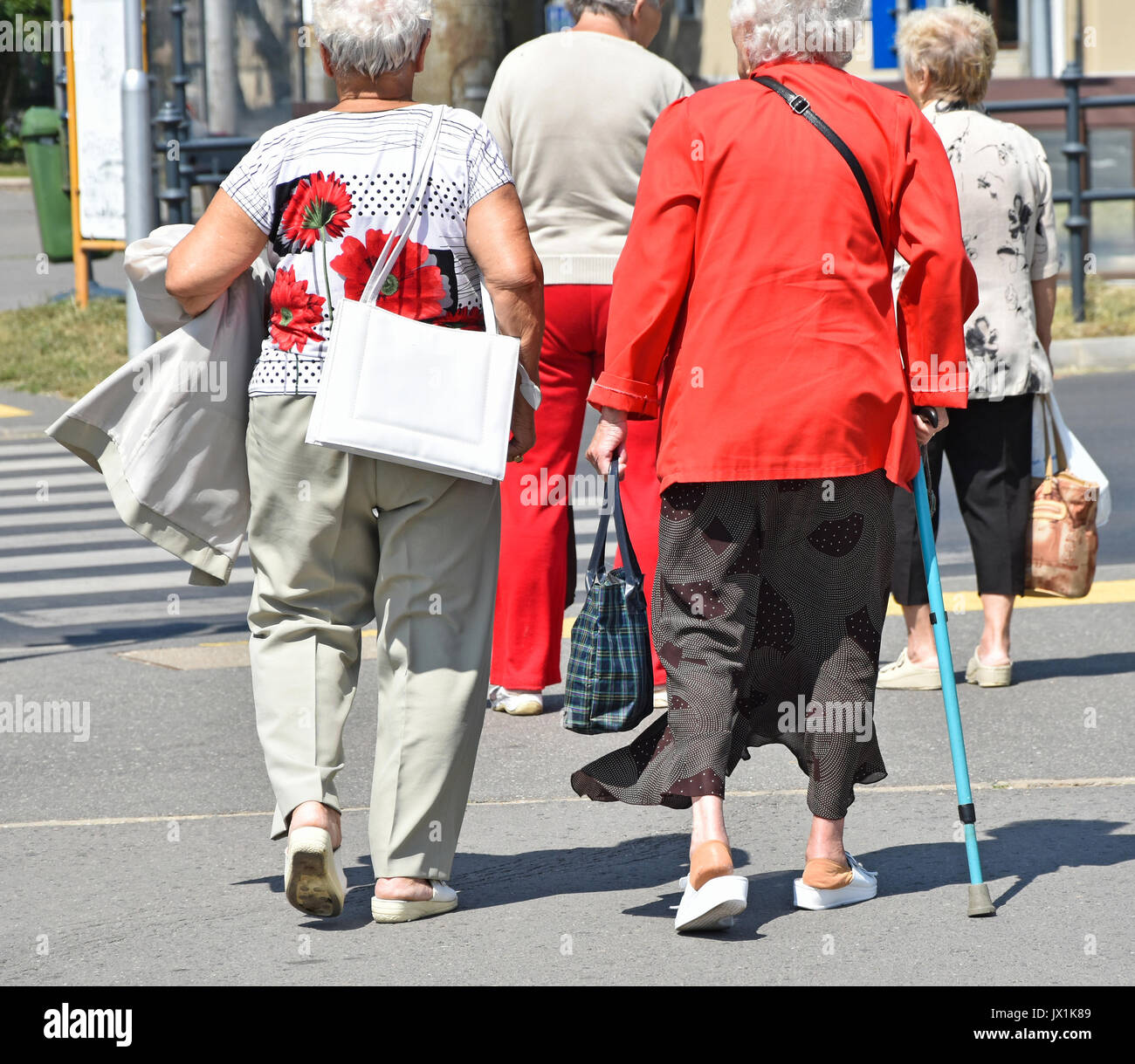 Old people are walking on the street Stock Photo - Alamy