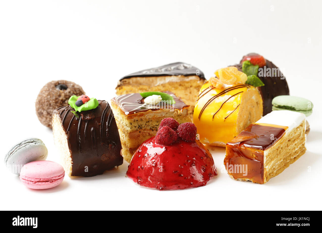 Assorted mini cakes sweet dessert, chocolate and fruit Stock Photo - Alamy