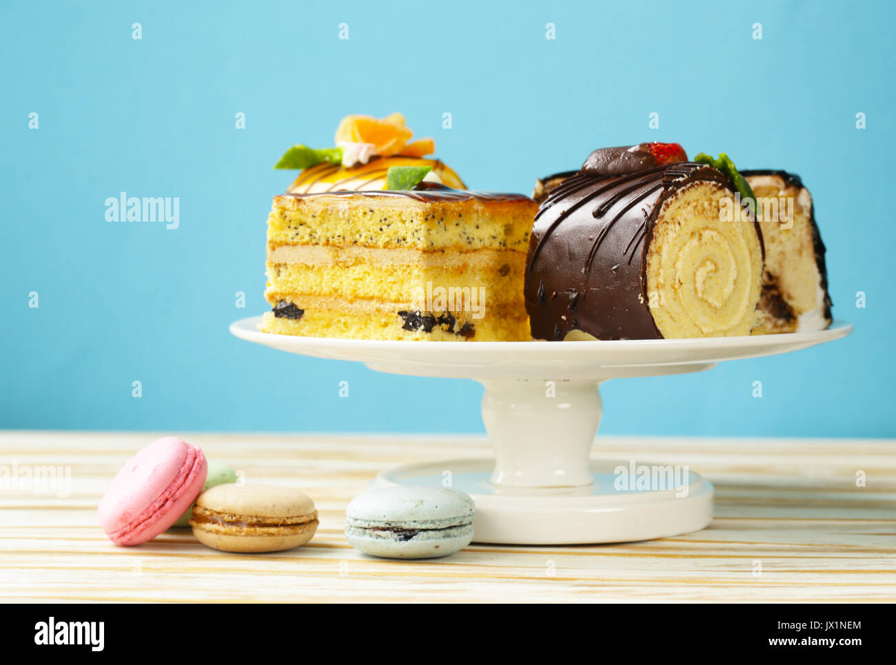 Assorted mini cakes sweet dessert, chocolate and fruit Stock Photo - Alamy