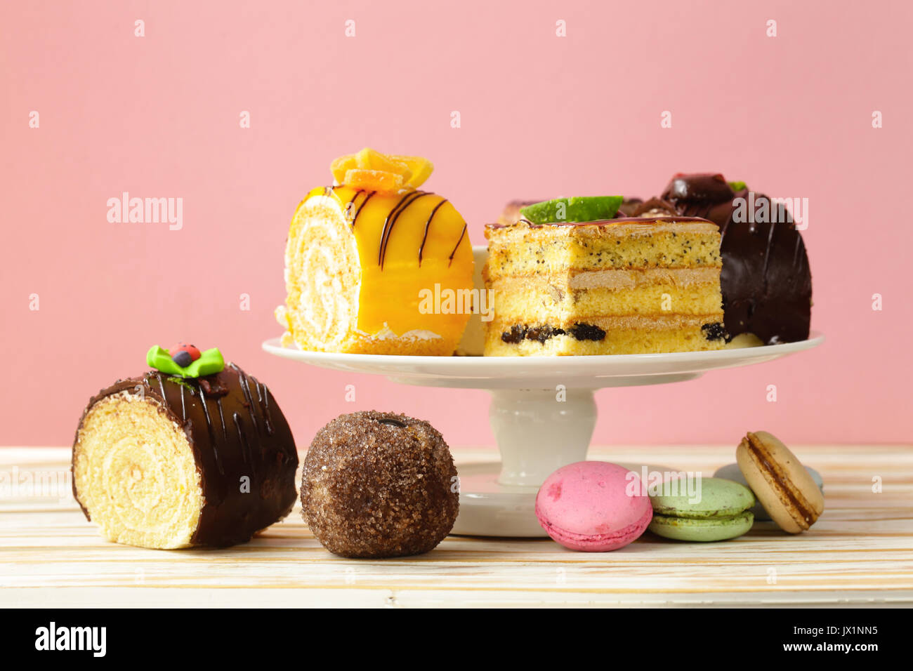 Assorted mini cakes sweet dessert, chocolate and fruit Stock Photo - Alamy