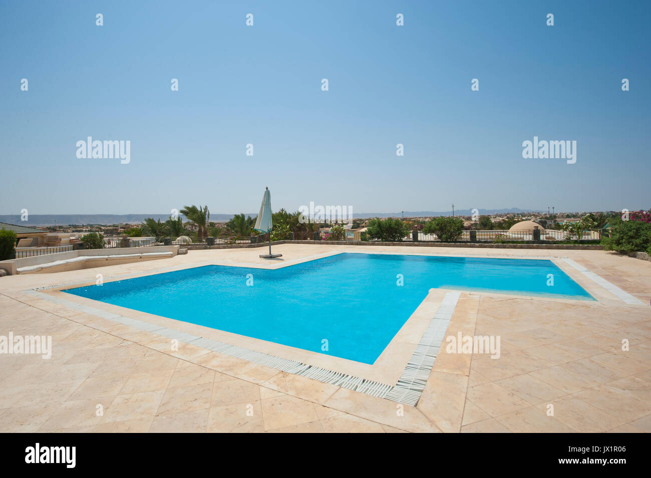 Luxury villa show home in tropical summer holiday resort with swimming ...