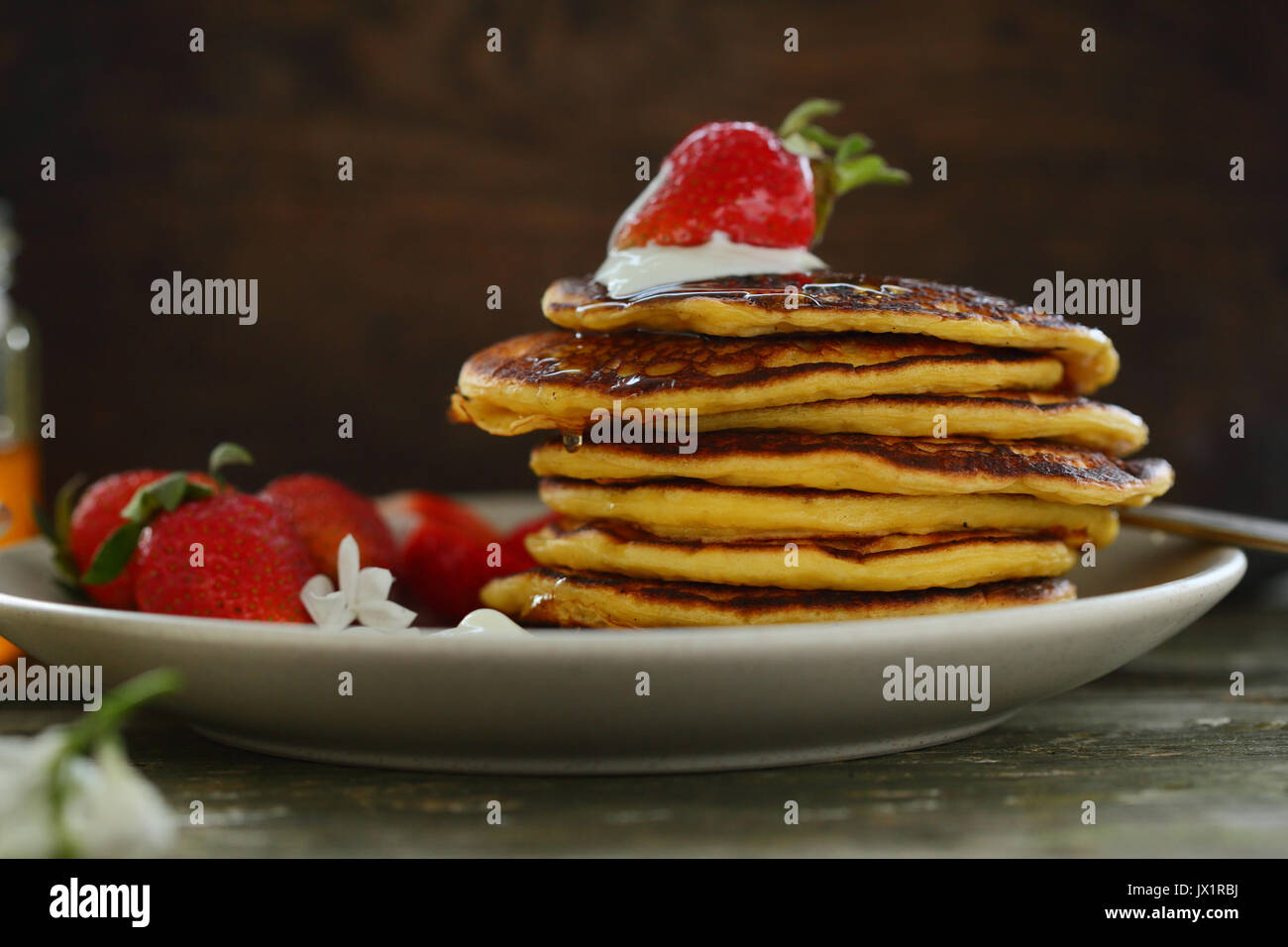 Rustic Breakfast pancake with fruits and honey, food closeup Stock ...