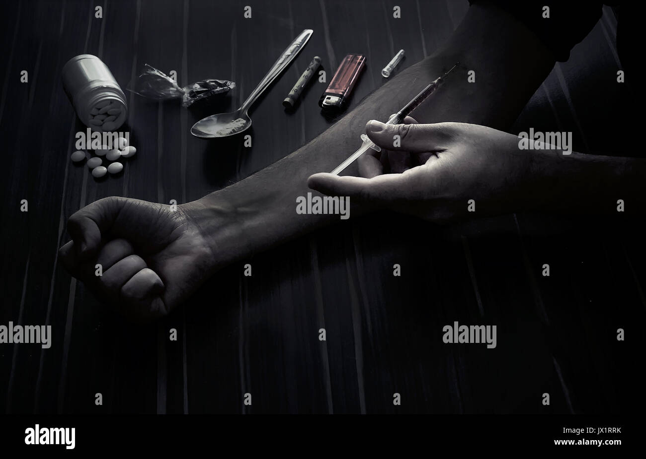 Drug addict injecting heroin in hi-res stock photography and images - Alamy