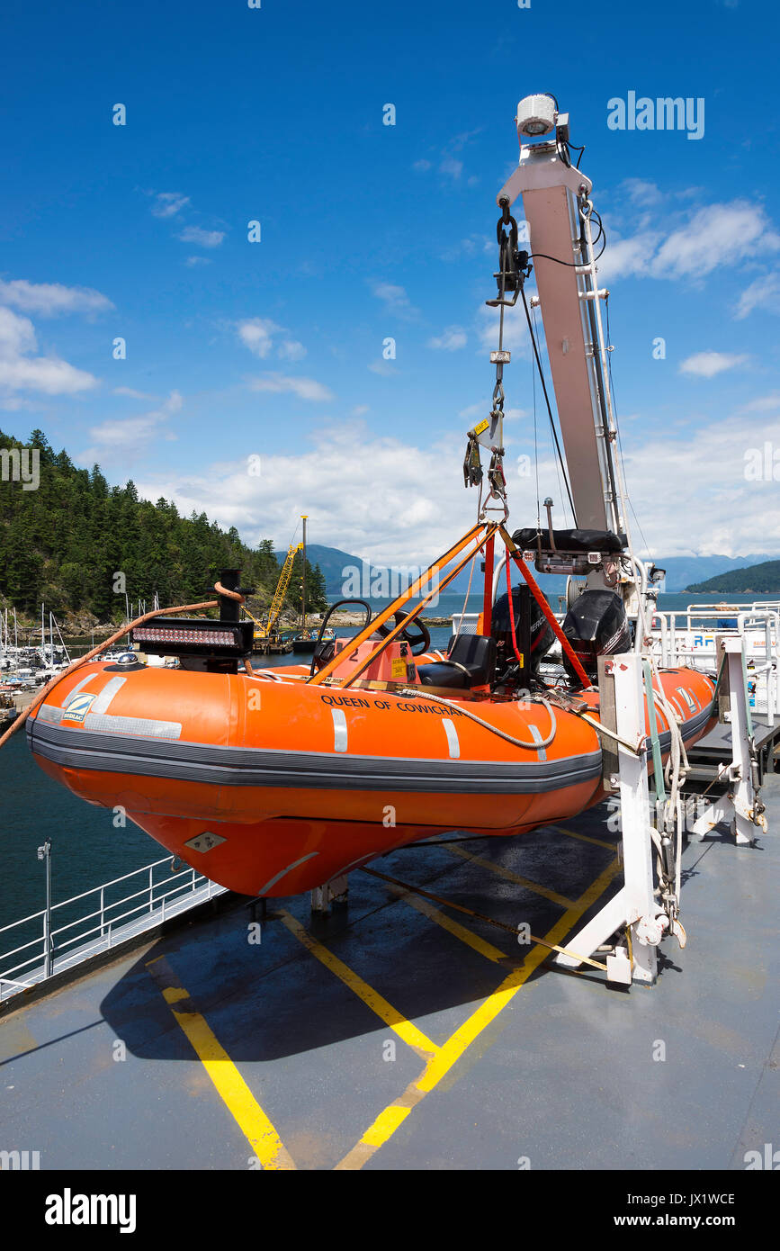 An Orange Zodiac Lifeboat on the Deck of BC Ferries Car and Passenger ...