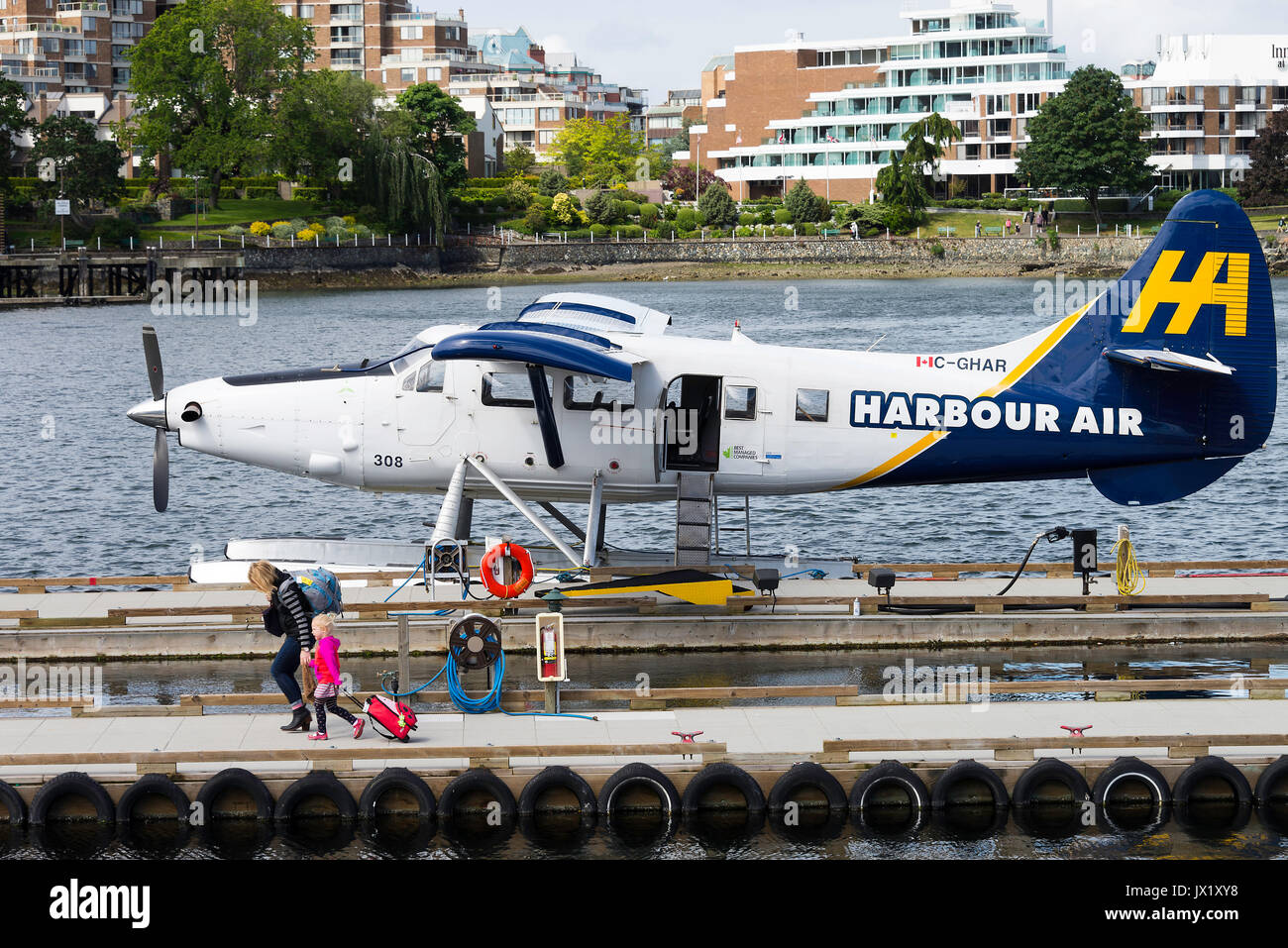 Colourful Seaplanes in the Inner Harbour Area of Victoria with Boats ...