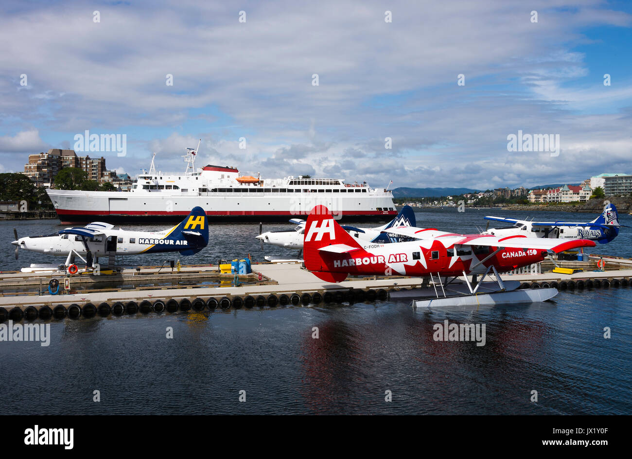 Colourful Seaplanes in the Inner Harbour Area of Victoria with Boats ...