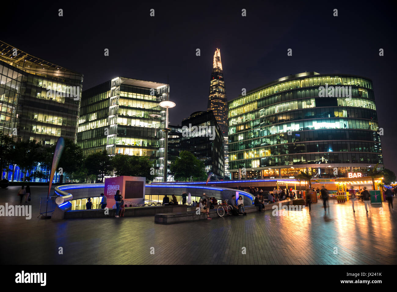 Waterfront at night, More London Riverside, The Shard at back, London ...