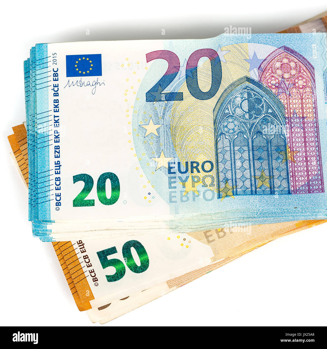Pills of Bills paper 20 and 50 euro banknotes, on white background ...