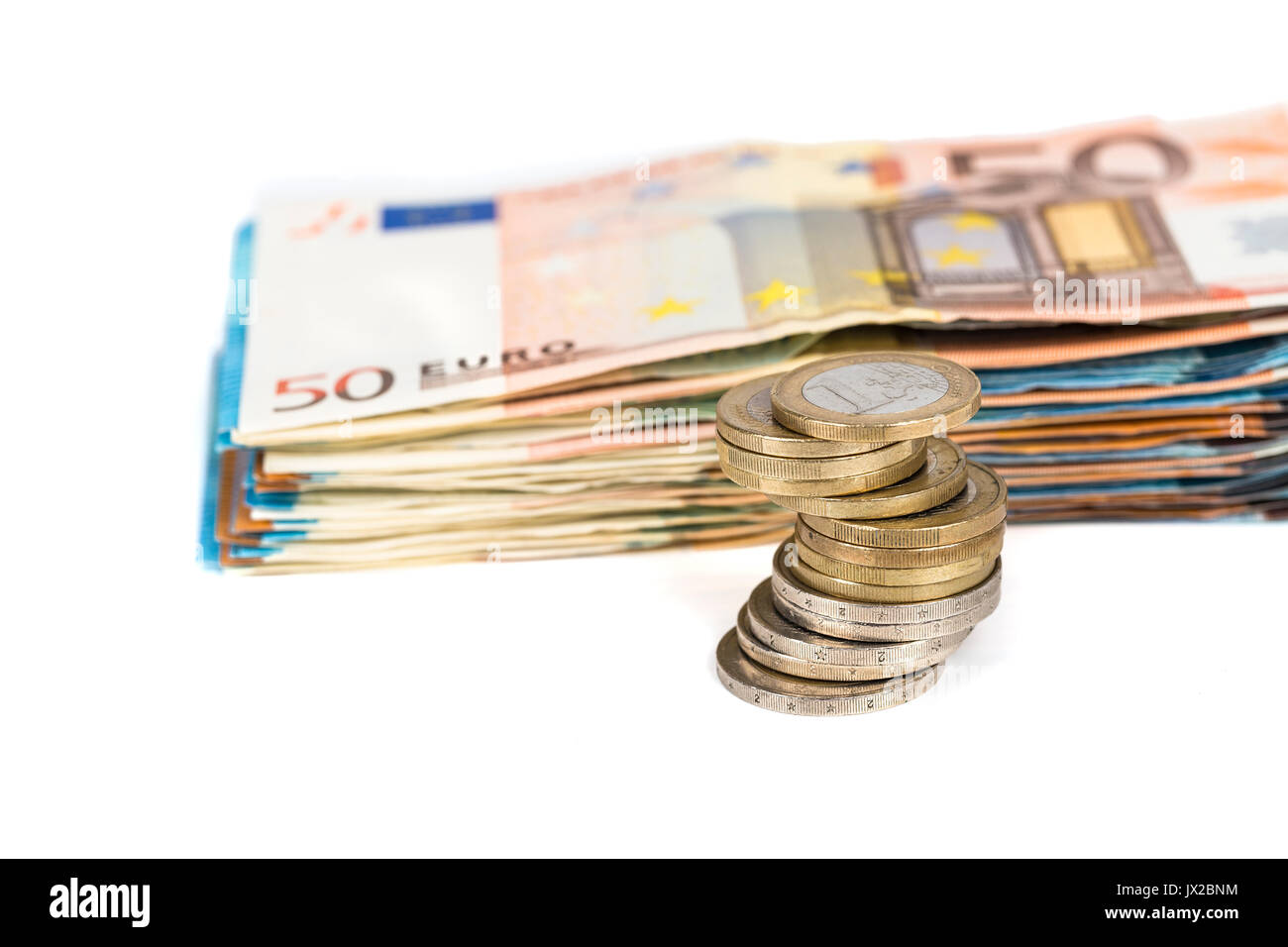 Pile of banknotes bills and pile of coins European currency money Stock ...