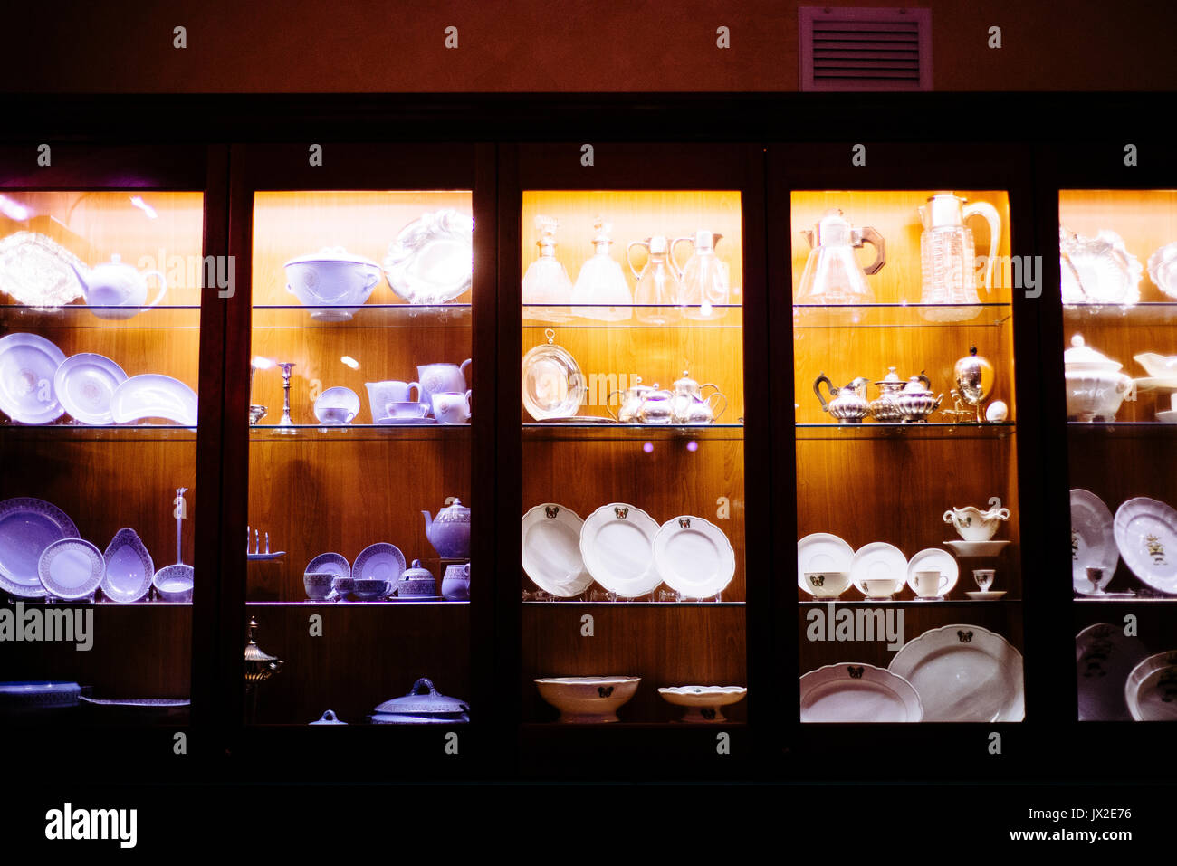 Showcase with antique ceramic collection Stock Photo - Alamy