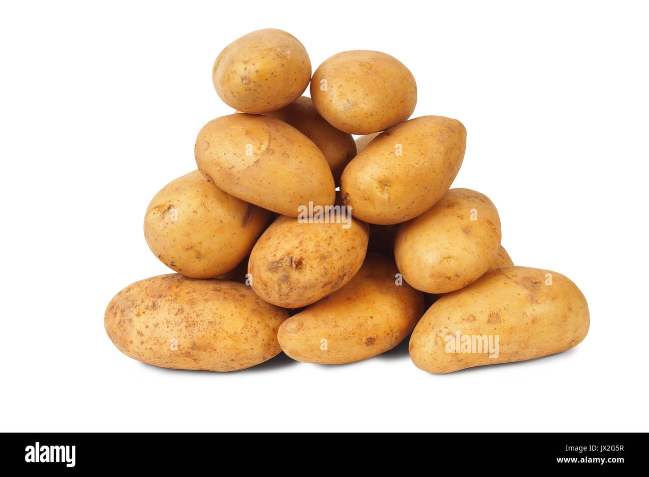 Heap of potatoes isolated on white background Stock Photo - Alamy