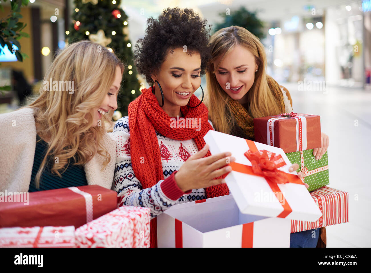 Curious women inside box hi-res stock photography and images - Alamy