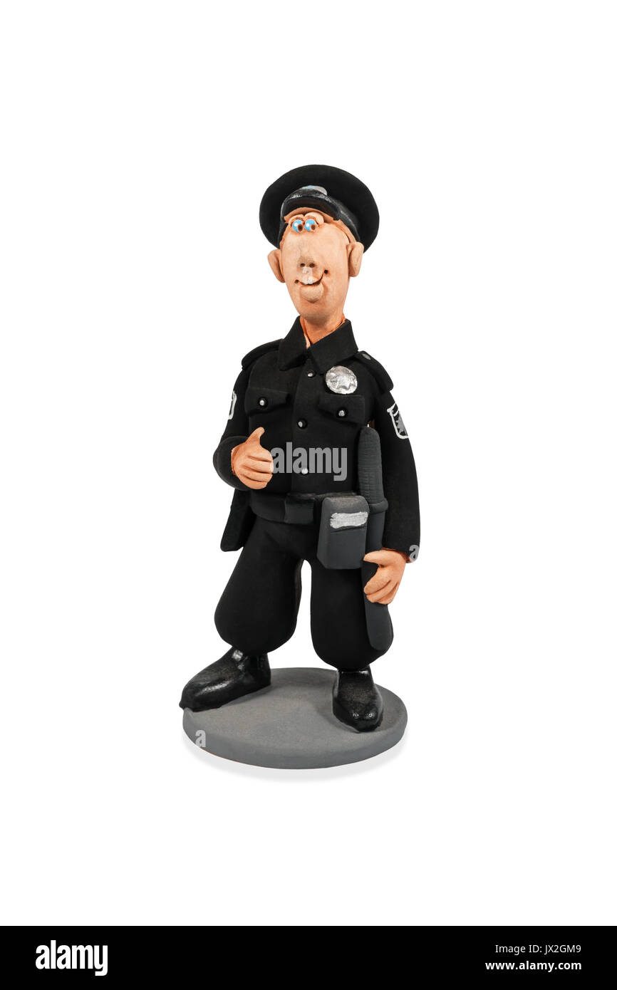 Clay statuette of smiling policeman in black uniform isolated on white ...