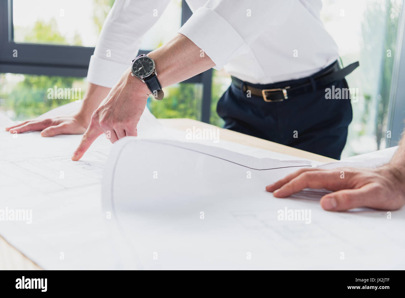 professional architects in formal wear working at modern office Stock ...