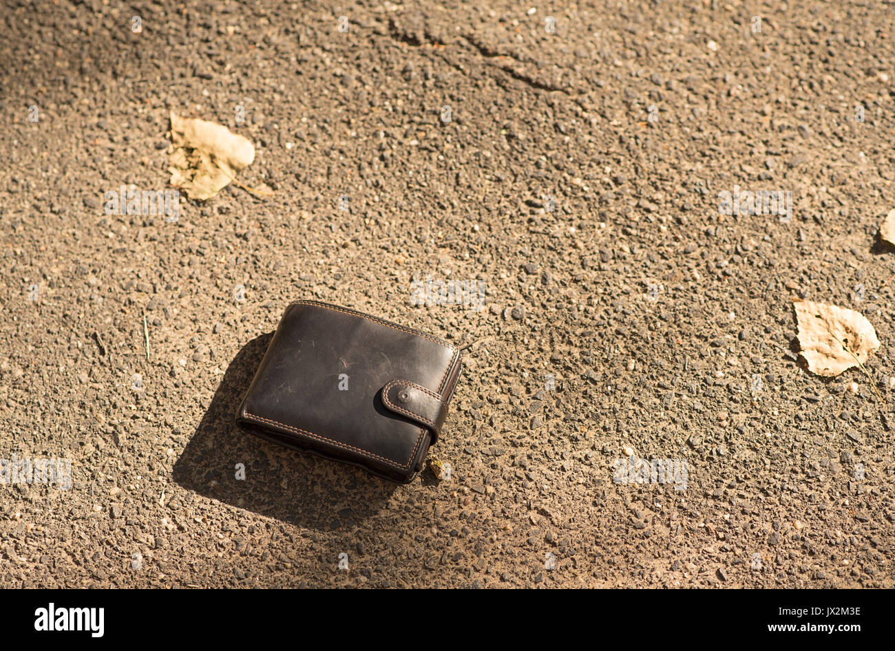 Lost wallet on road hi-res stock photography and images - Alamy