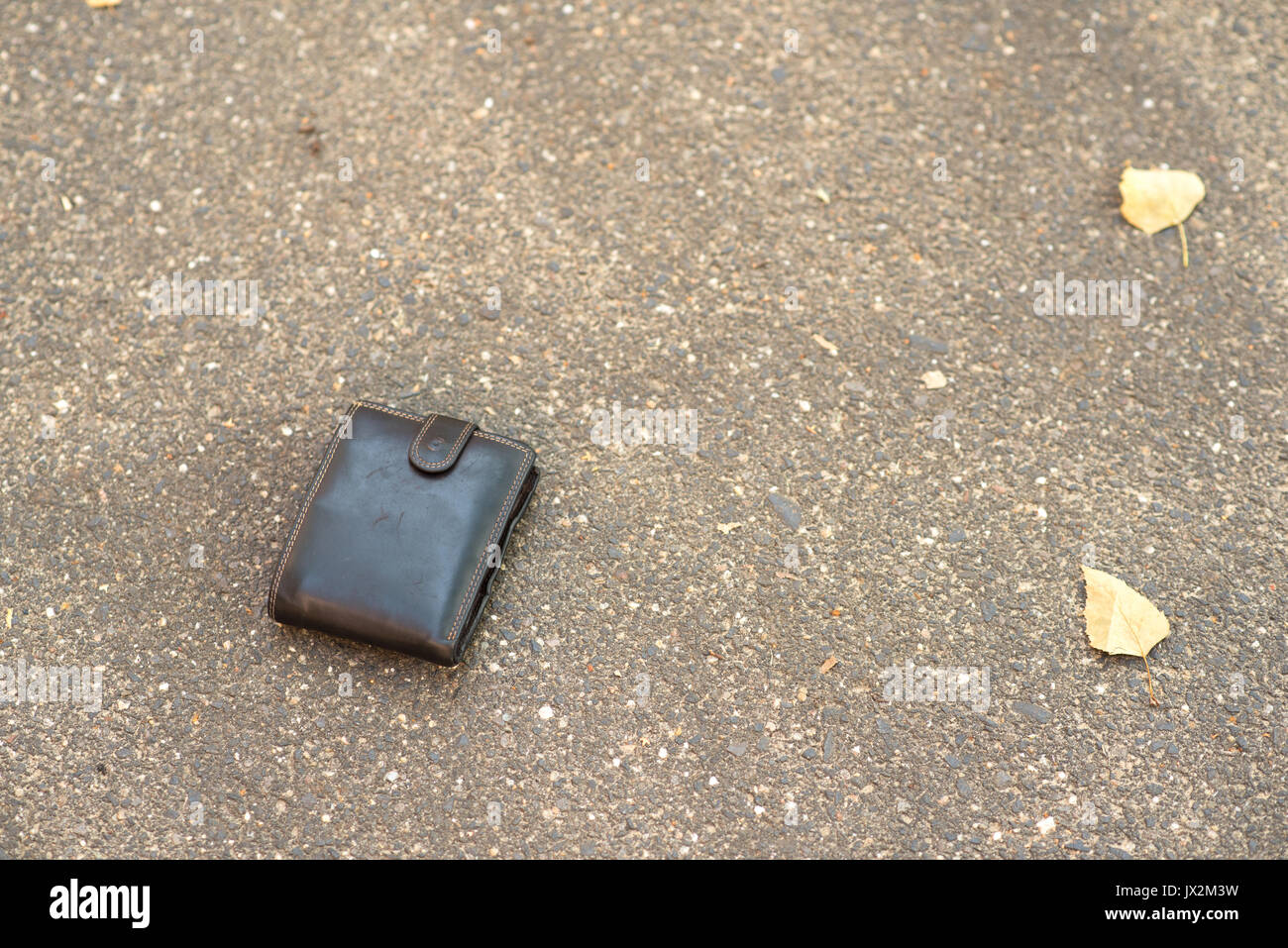 Lost wallet lying on street hi-res stock photography and images - Alamy