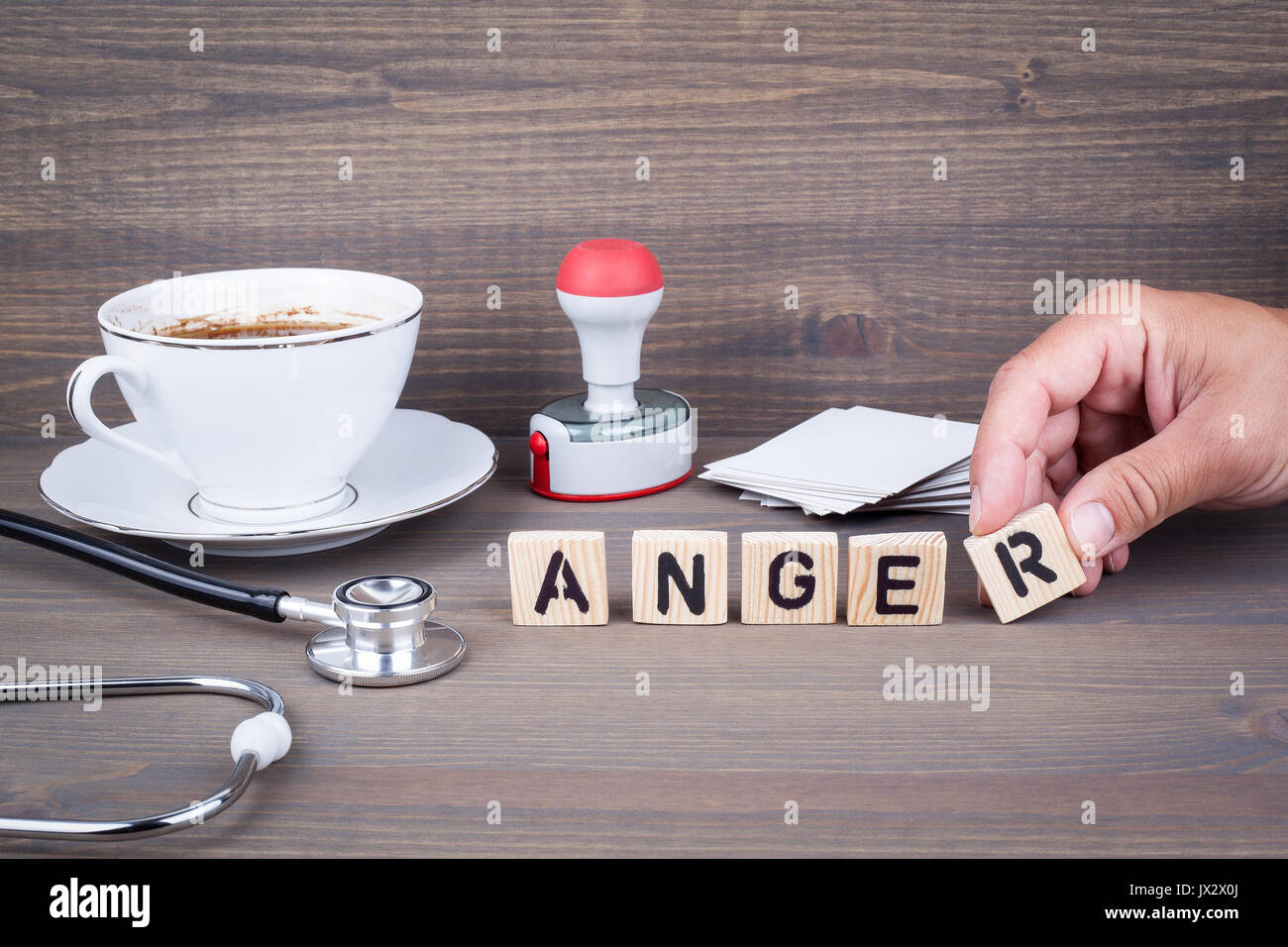 Anger. Wooden letters on dark background. Office desk Stock Photo - Alamy