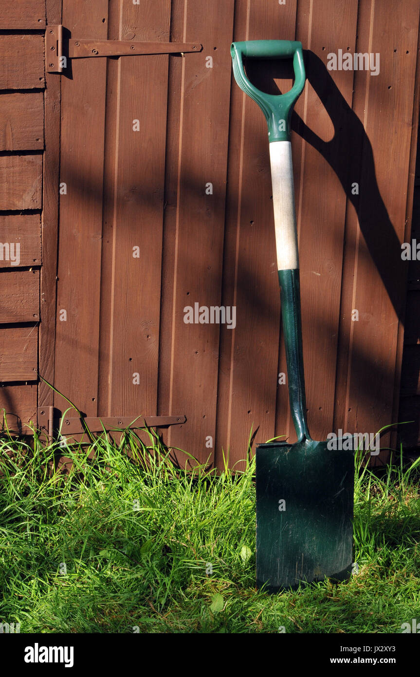 garden tools and axes choppers spades and forks to dig the garden and ...