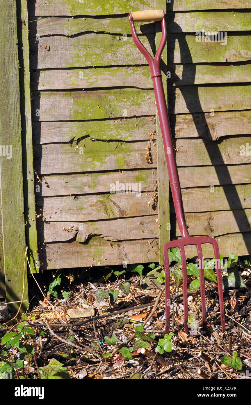 garden tools and axes choppers spades and forks to dig the garden and ...