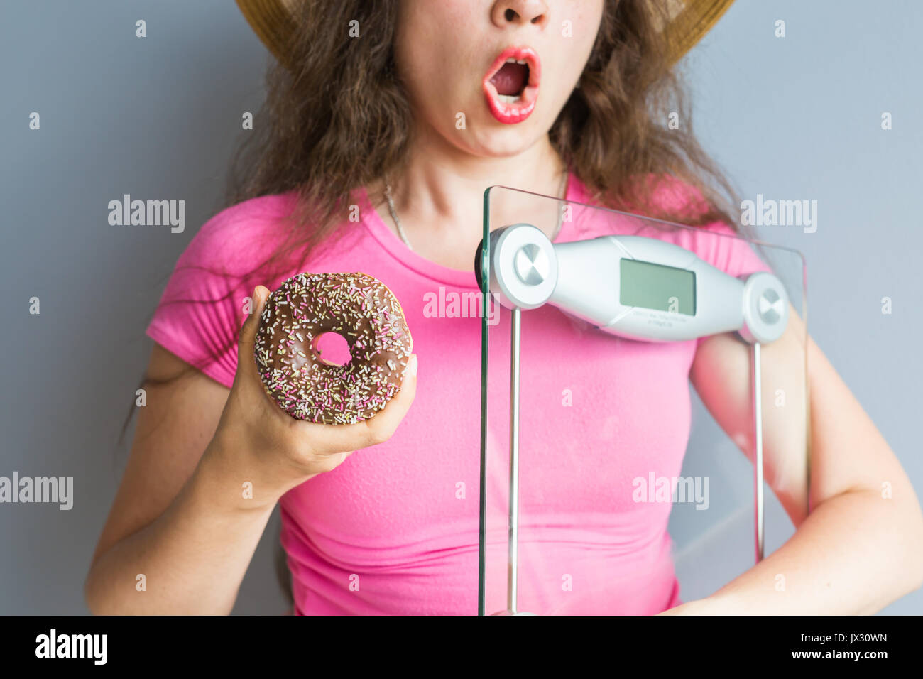 Funny weighing scale hi-res stock photography and images - Alamy