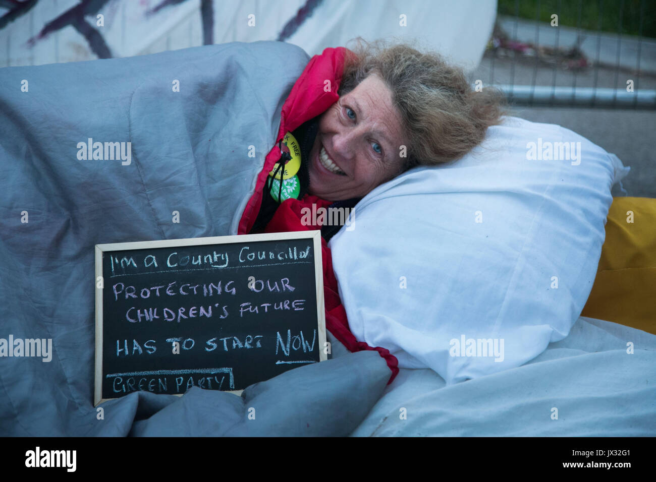 12 local activists locked themselves in specially made arm tubes to ...