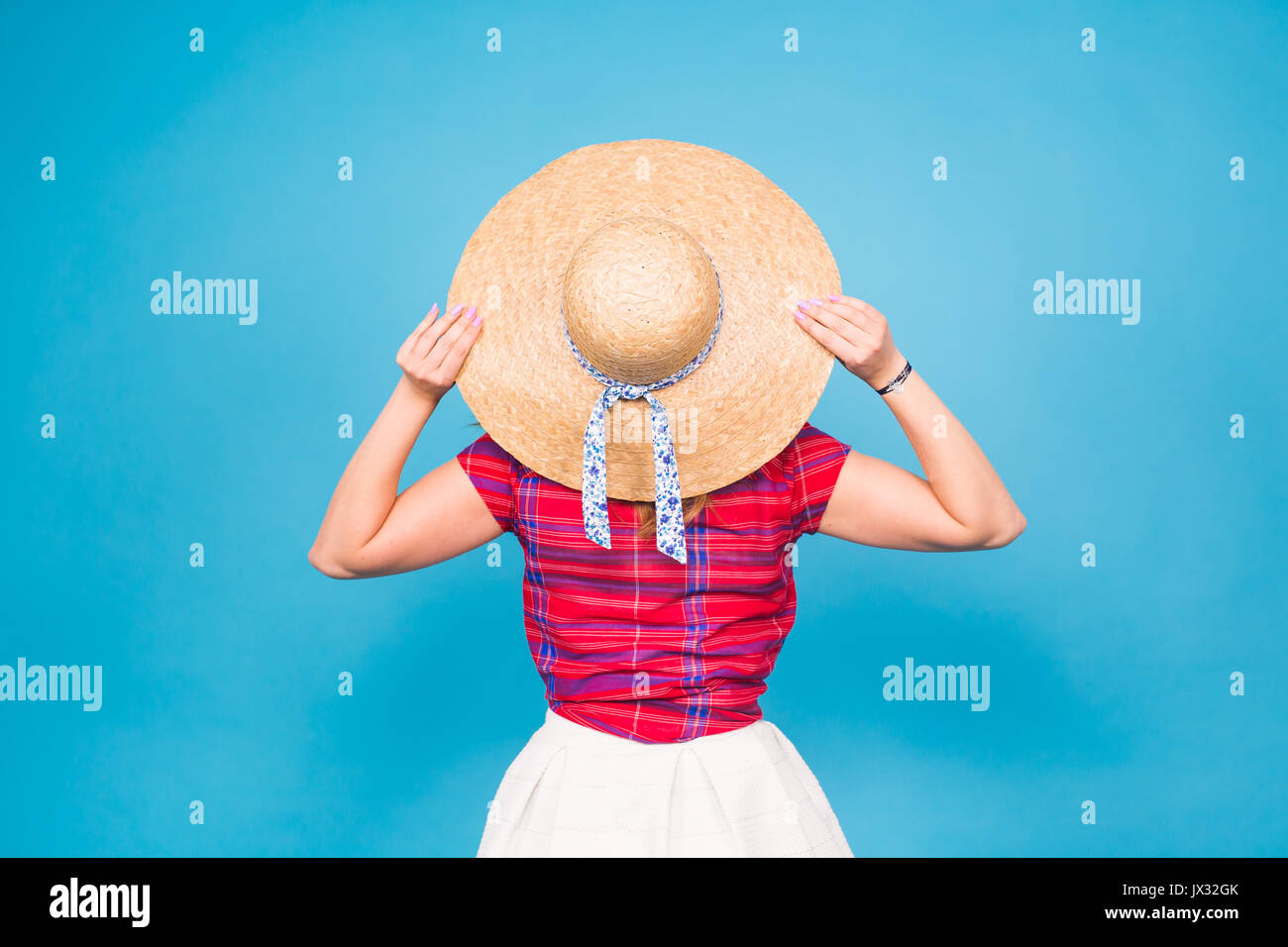 Beautiful woman in hat, back view Stock Photo - Alamy