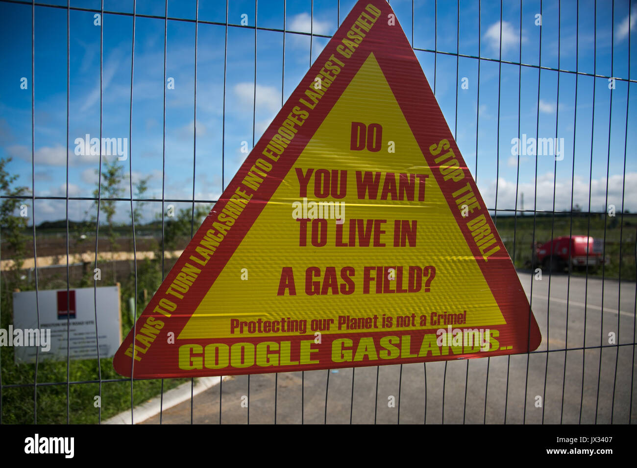 An anti-fracking sign hung on the gates to Quadrilla's fracking site in ...