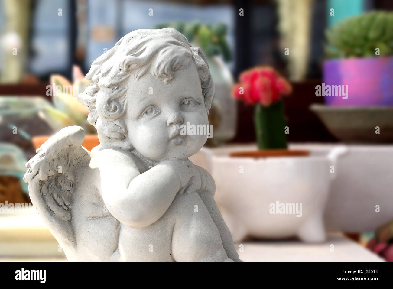 Small cupid statue hi-res stock photography and images - Alamy