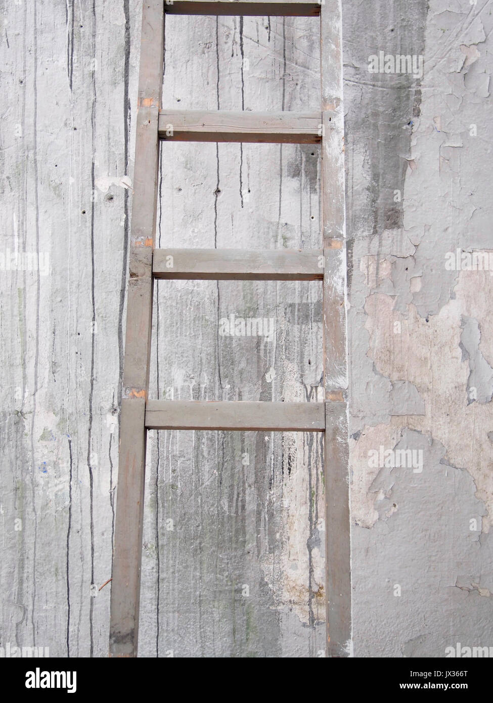 Old wood ladder on a wall Stock Photo - Alamy