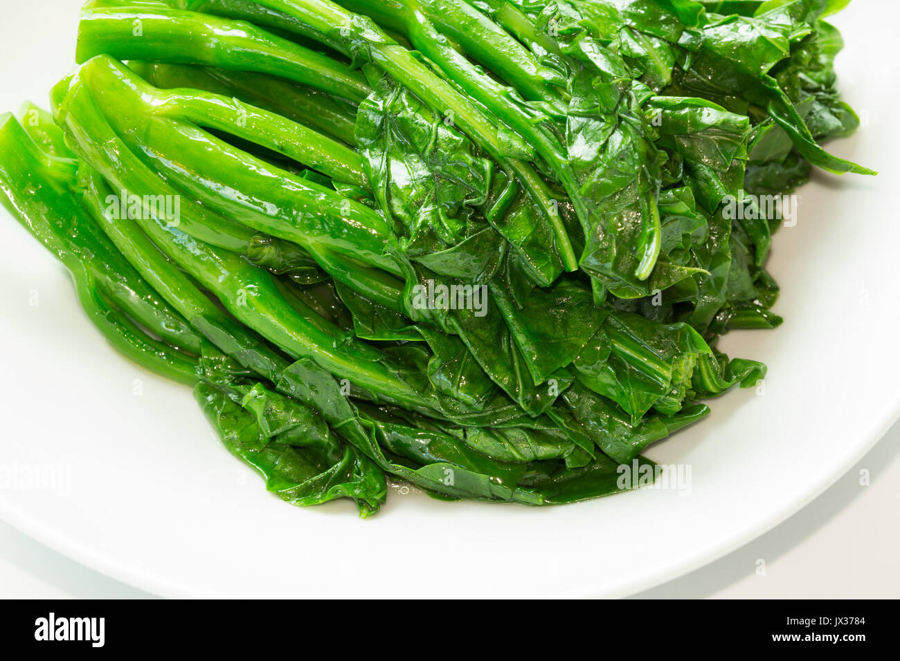 Fresh green gai lan Stock Photo - Alamy