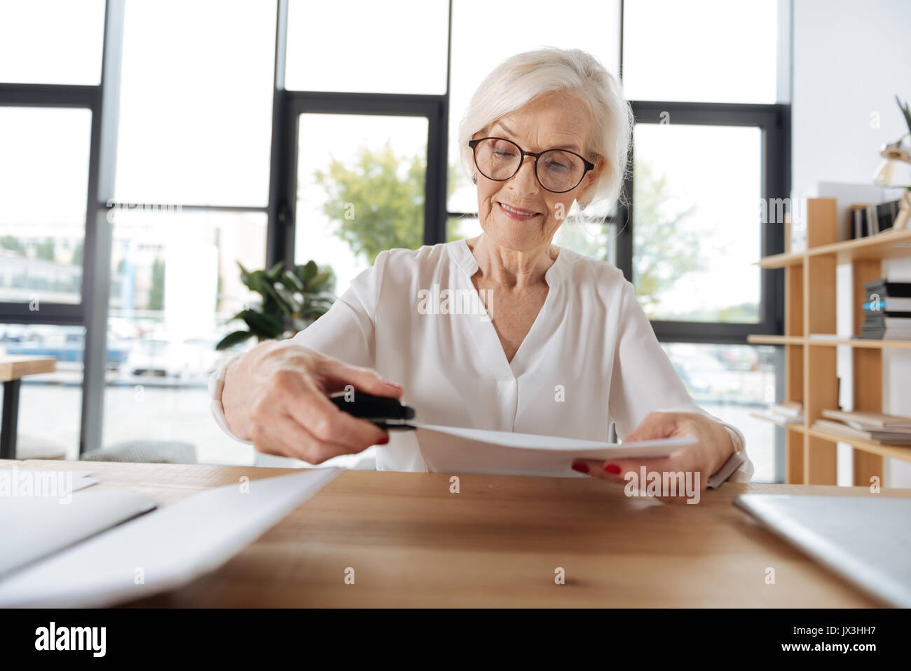 Person using stapler hi-res stock photography and images - Alamy