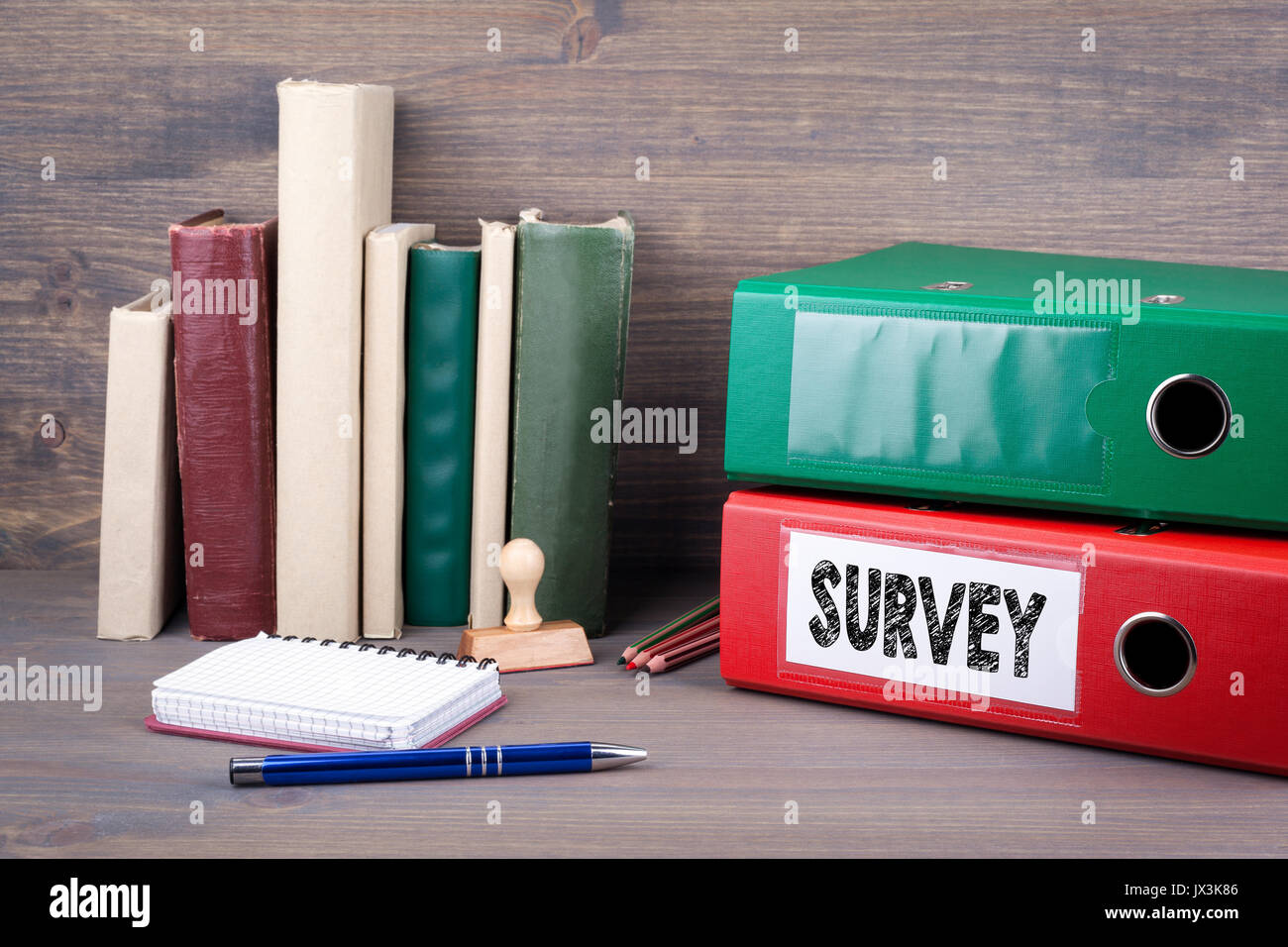 Survey. Binder on desk in the office. Business background Stock Photo ...