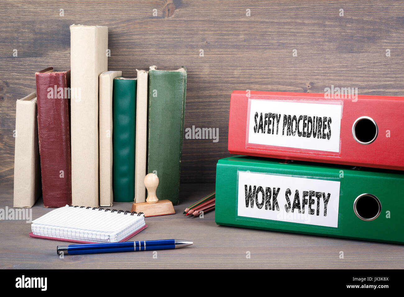 Work Safety and Safety Procedures. Binders on desk in the office ...