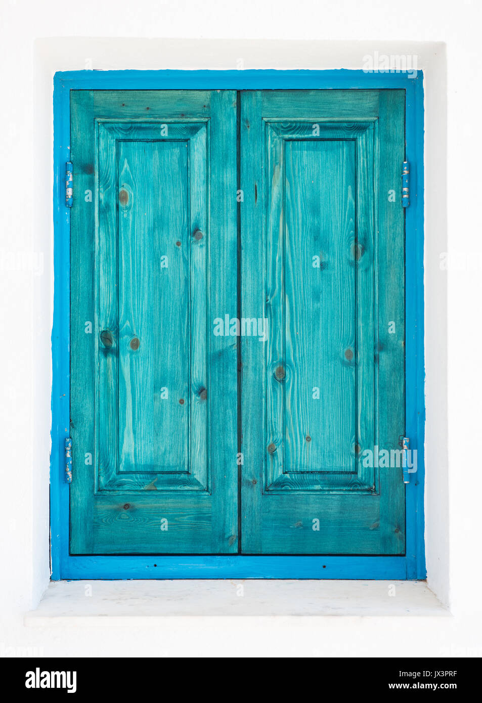 Building exterior with turquoise shutters hi-res stock photography and ...