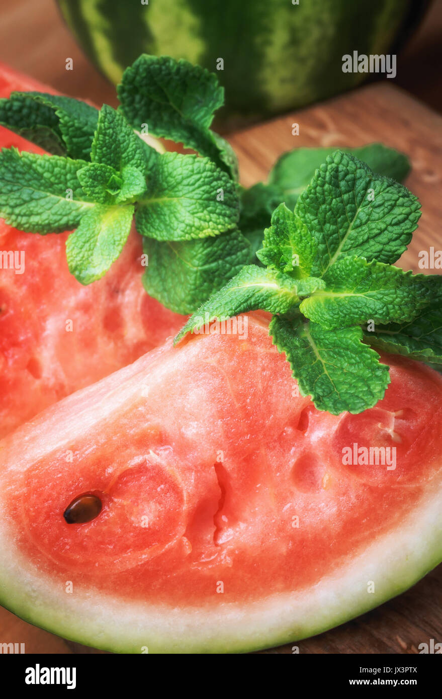 watermelon drink watermelon pieces in a rustic wooden background Stock ...