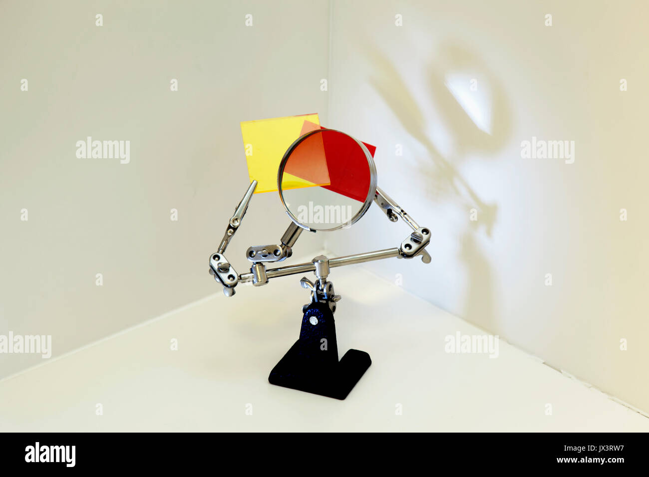 A magnifier and plexiglass square shapes Stock Photo - Alamy