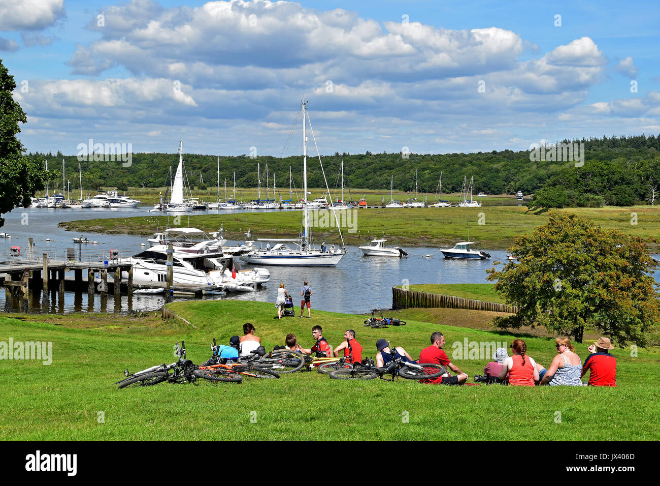 Visitors enjoying the views of Beaulieu river from Bucklers Hard, New ...