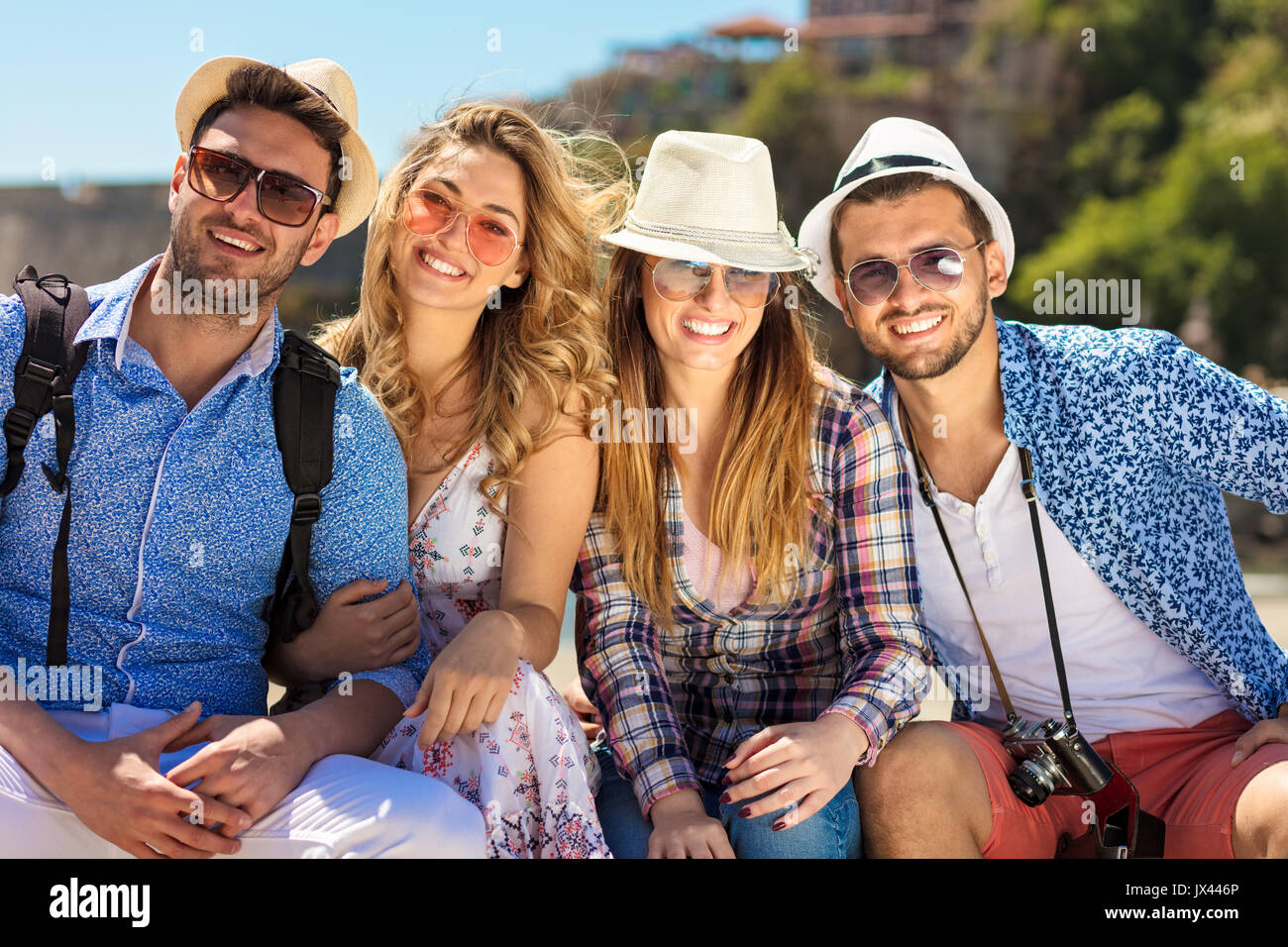Group of friends taking funny portraits outdoor Stock Photo - Alamy