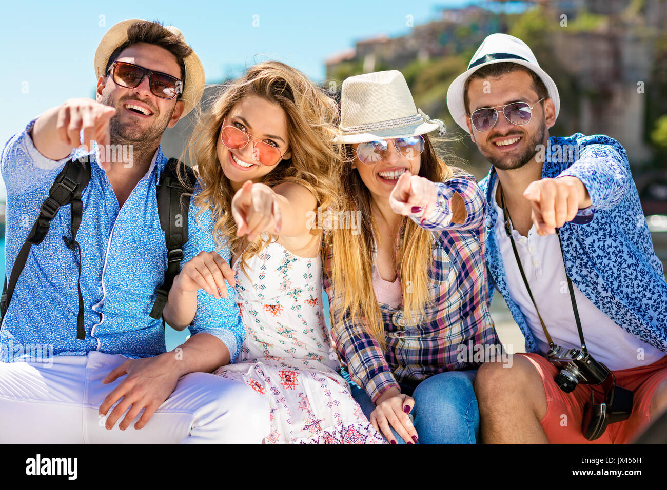 Group of friends taking funny portraits outdoor Stock Photo - Alamy