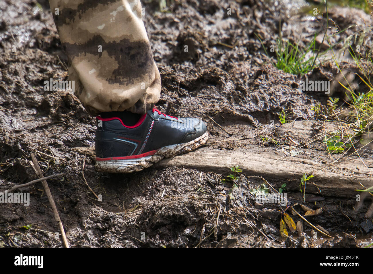 Hiking through mud hi-res stock photography and images - Alamy