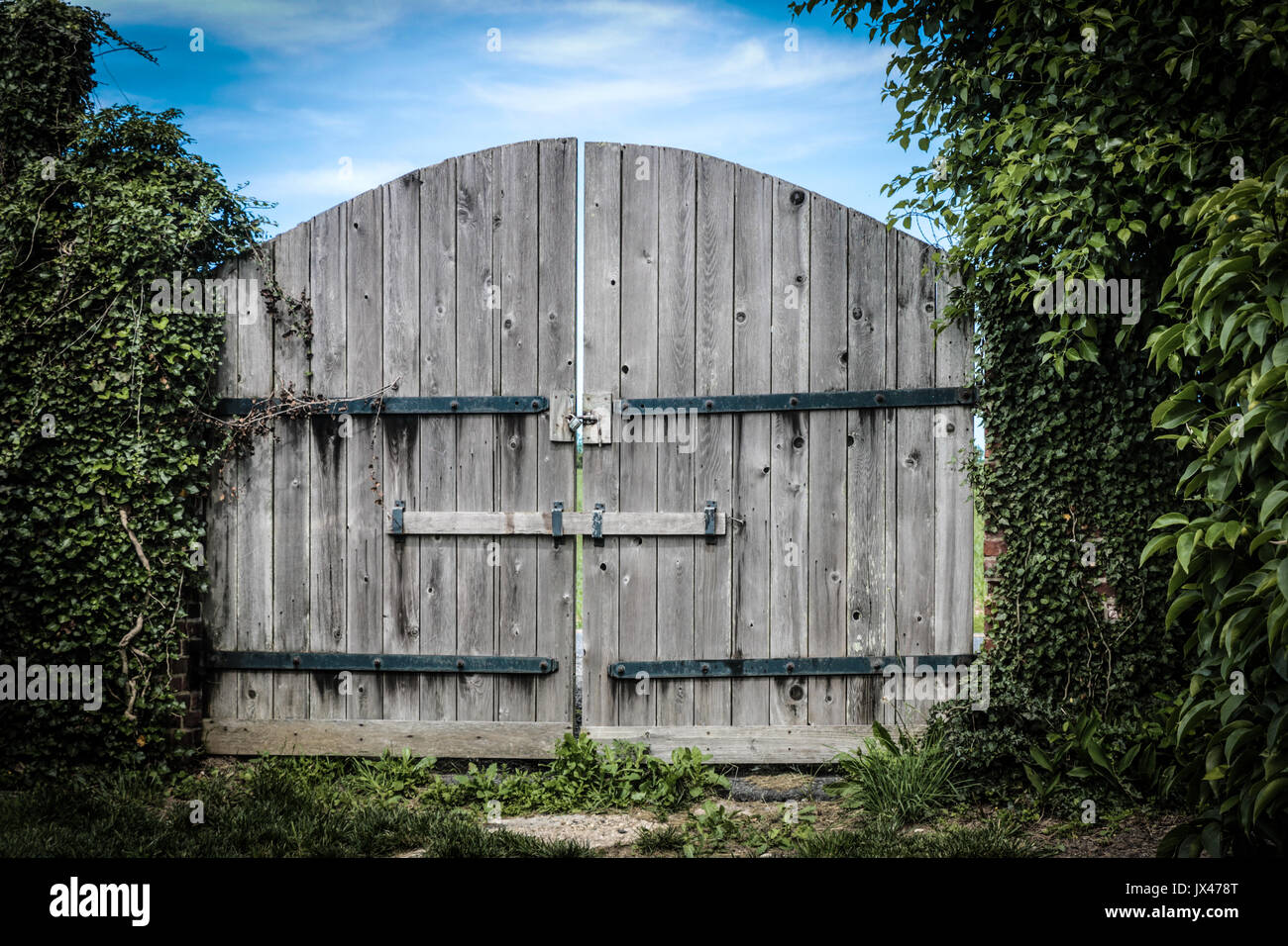 Old fashioned wooden privacy gate Stock Photo - Alamy