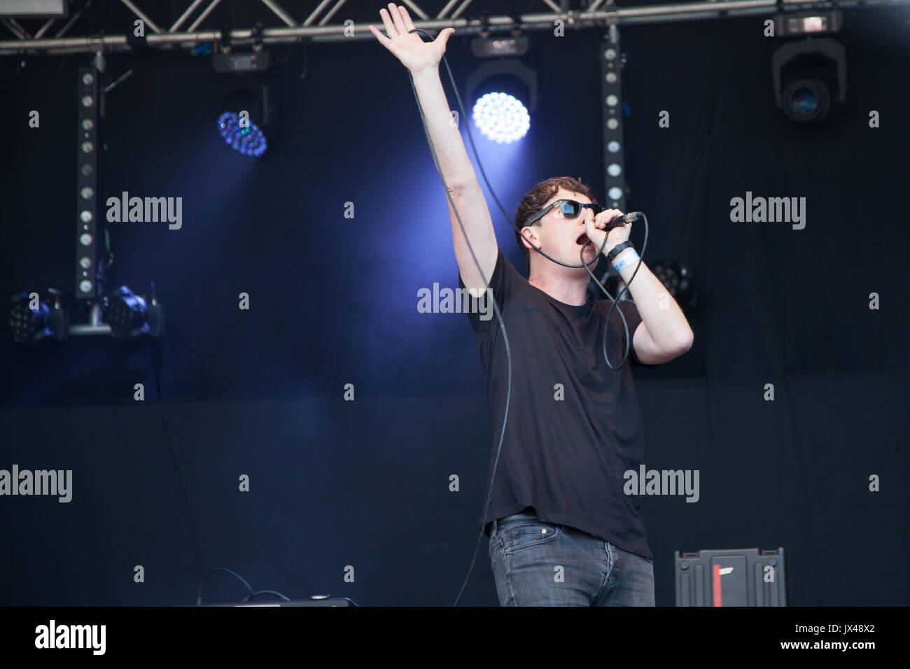 The lead singer of the band "The Whip" performs on stage at the Cotton ...