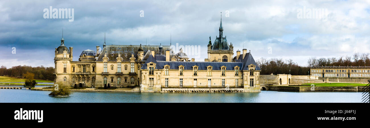 Palace of Chantilly in golden afternoon light Stock Photo - Alamy