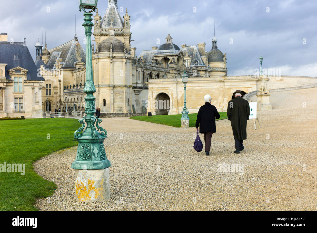Palace of Chantilly in golden afternoon light Stock Photo - Alamy